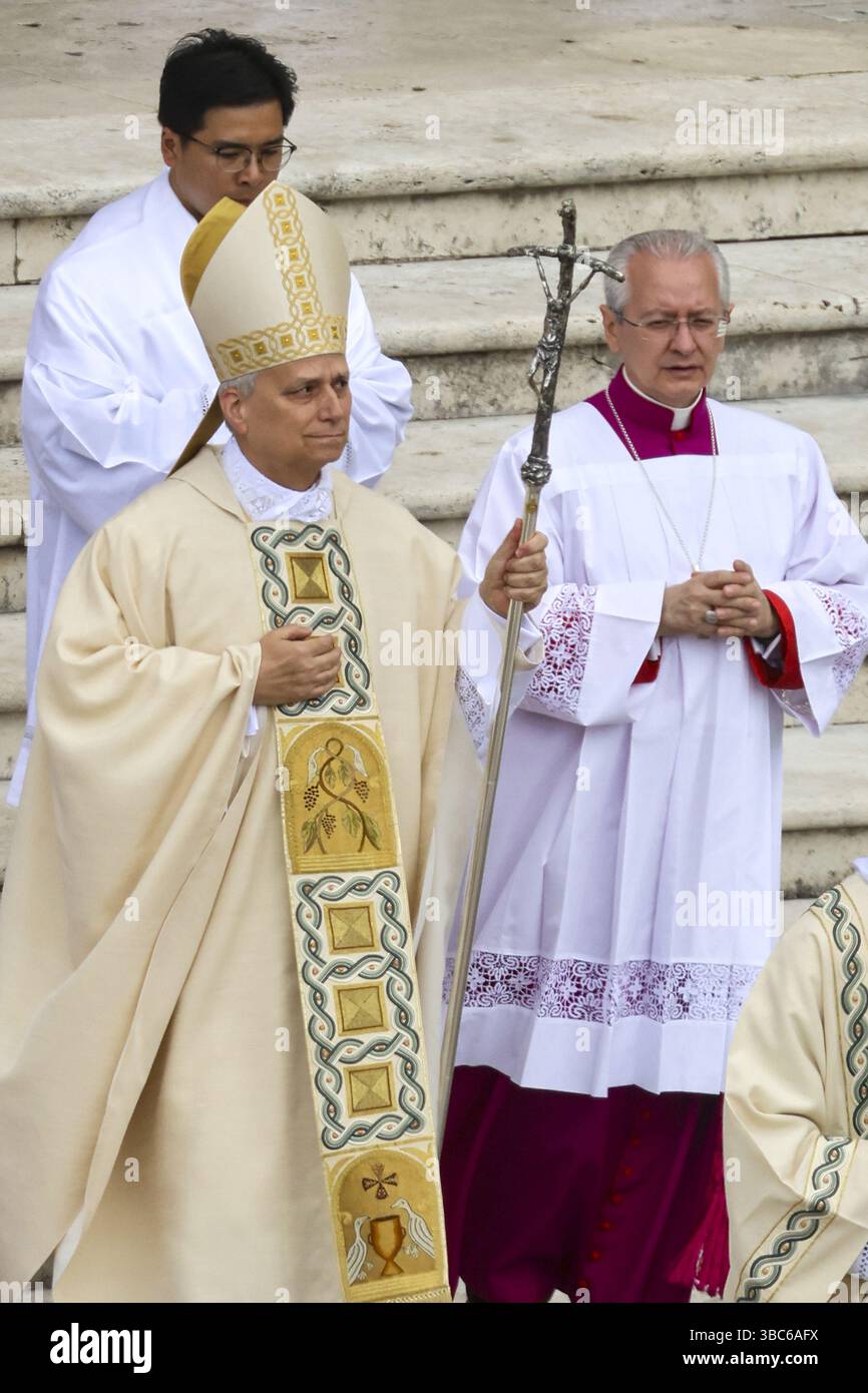 Pope Leo XIV holds his pastoral staff as he arrives for the inauguration Mass of his pontificate ...