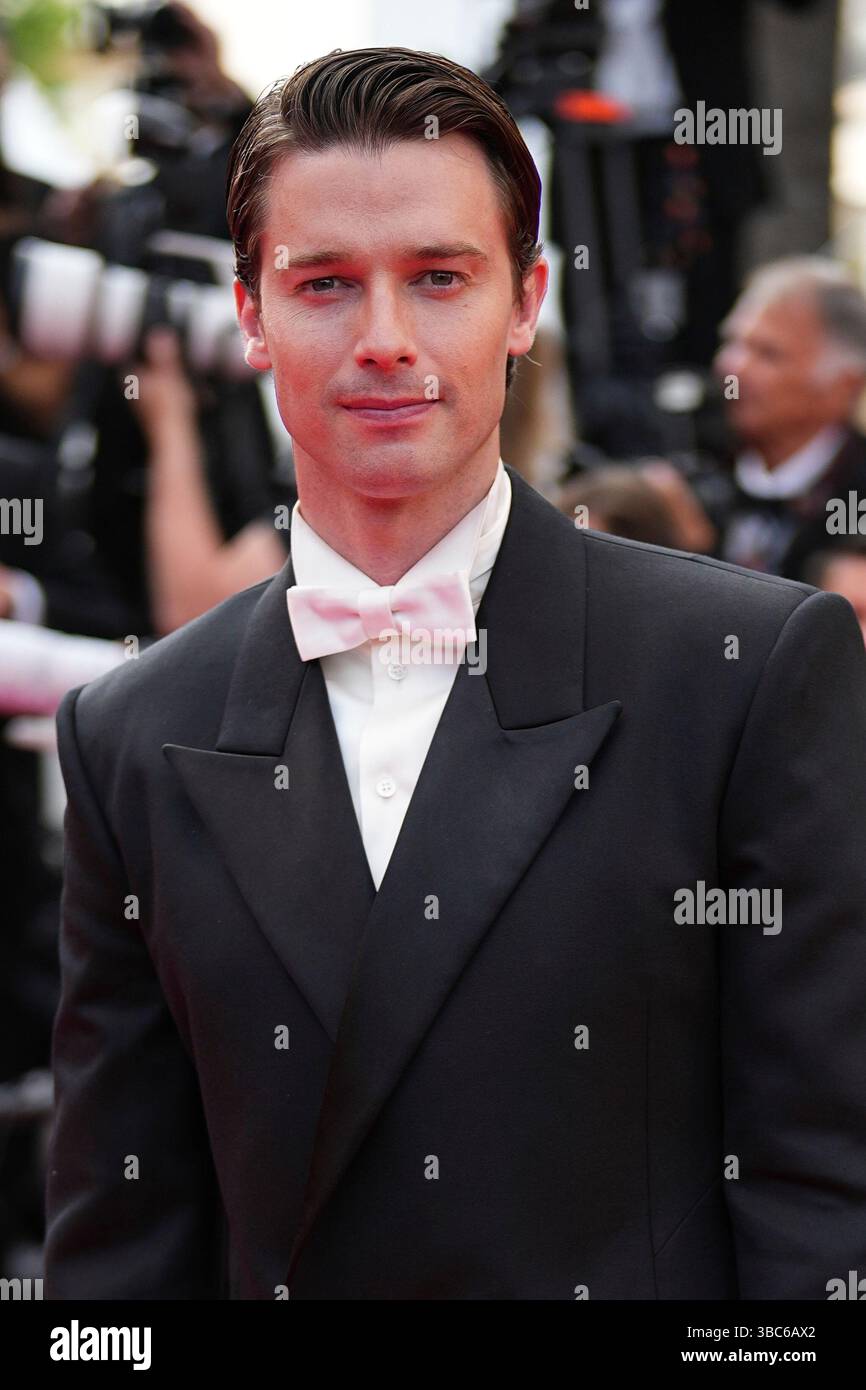 Patrick Schwarzenegger poses for photographers upon arrival at the ...