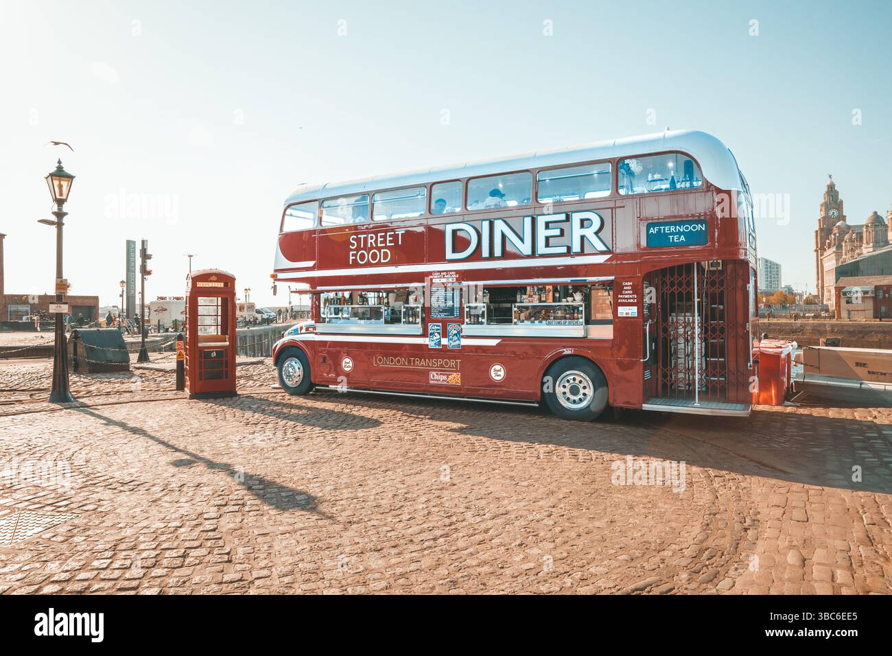 LIVERPOOL, UK , MAY 3, 2025. A vintage, red London double decker bus ...