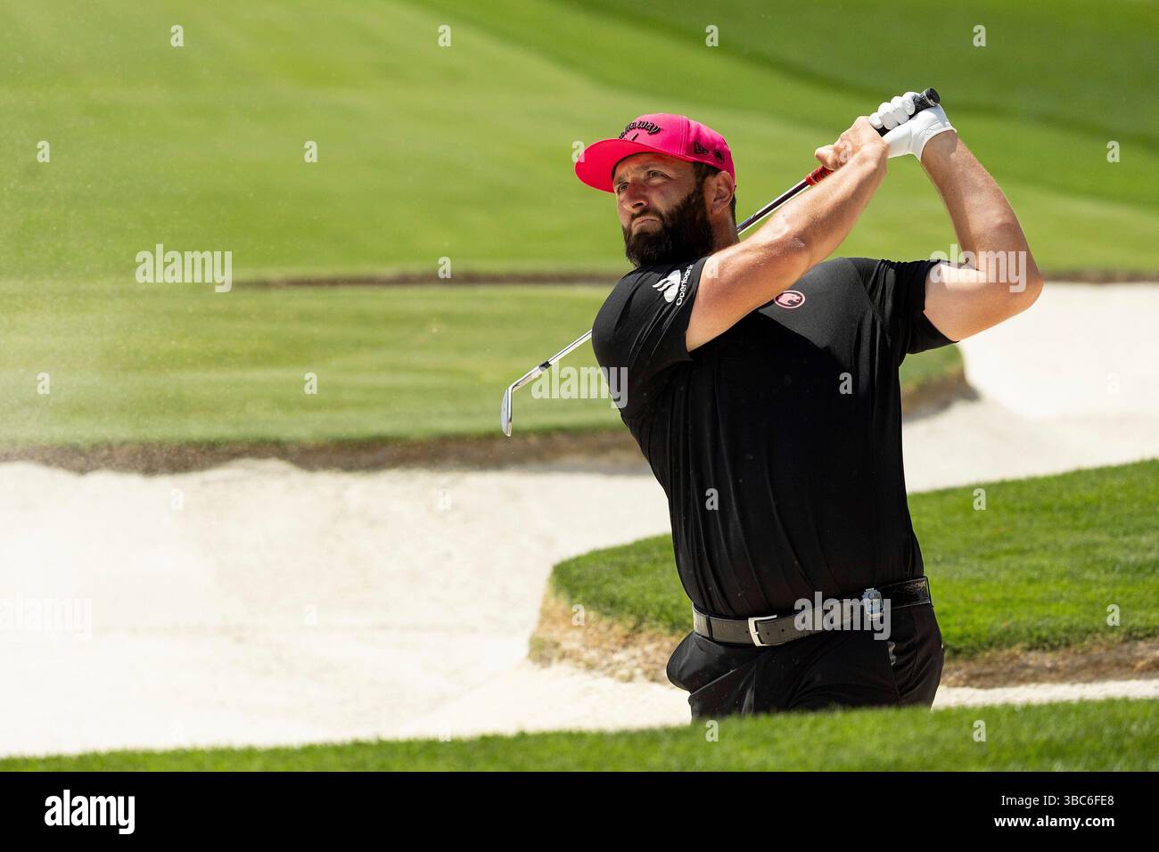 Captain Jon Rahm of Legion XIII hits his shot from a bunker on the ...