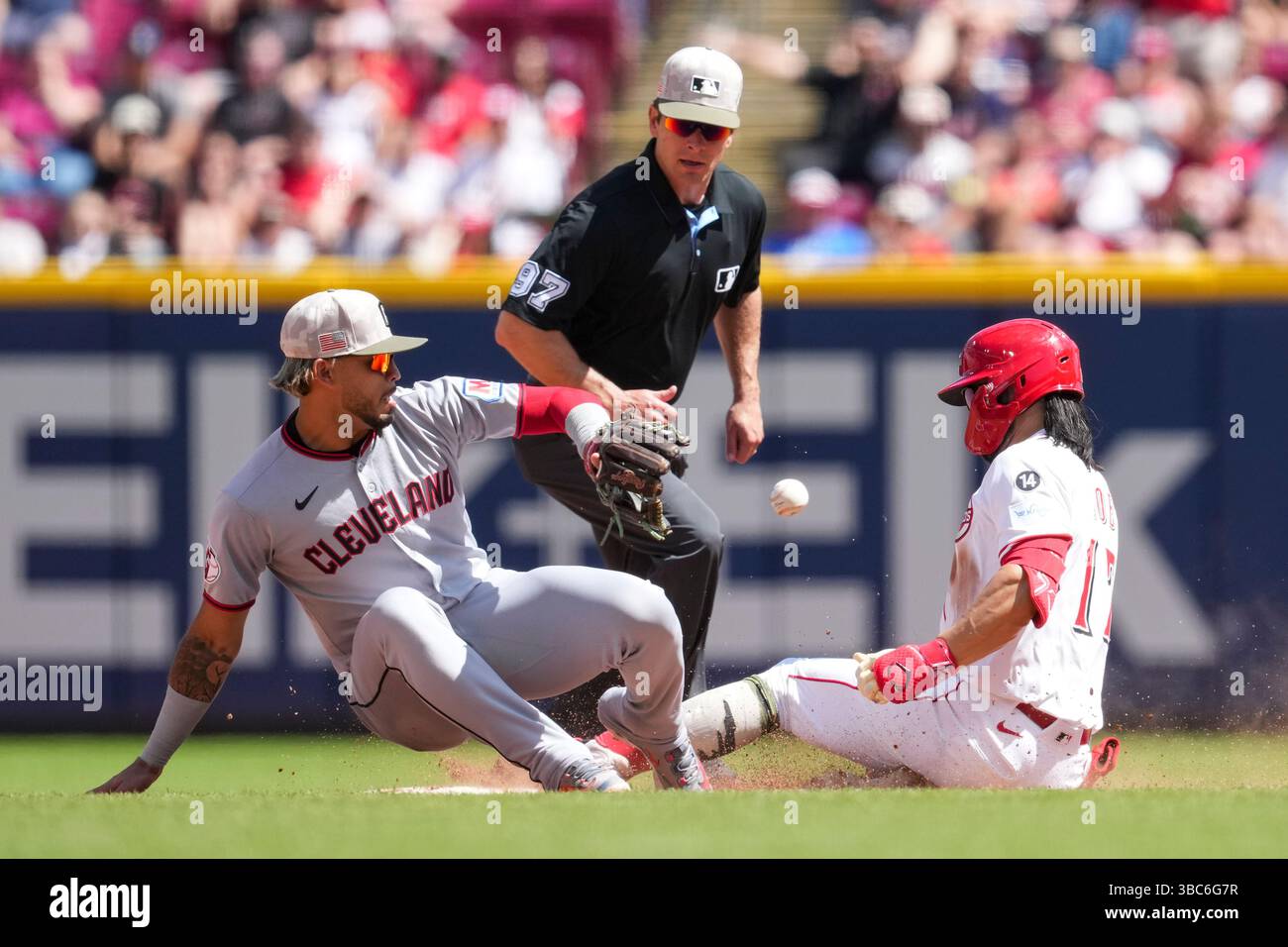 Cincinnati Reds' Connor Joe, right, reaches second base on a double ...