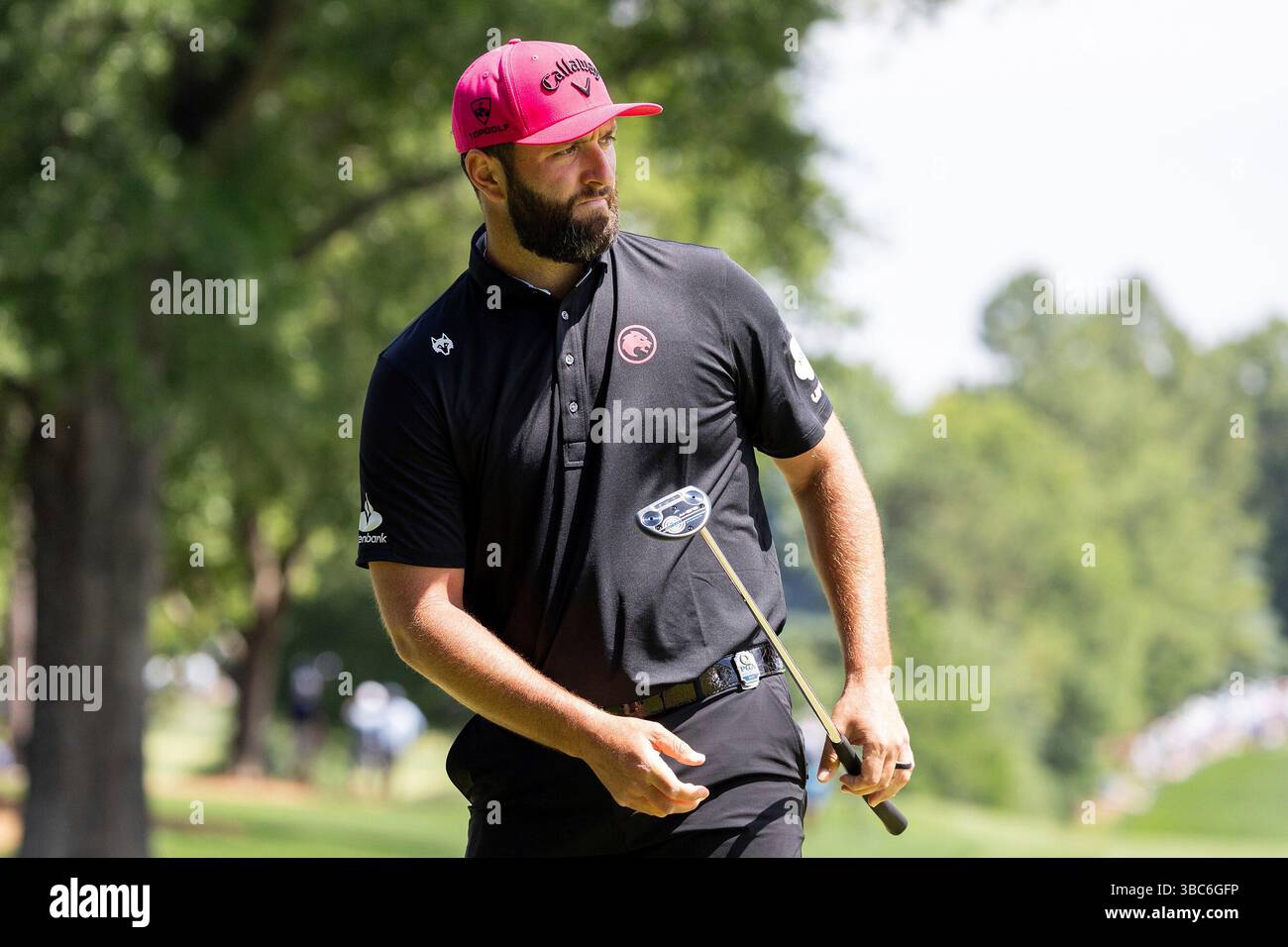 Captain Jon Rahm of Legion XIII watches his putt on the third green ...