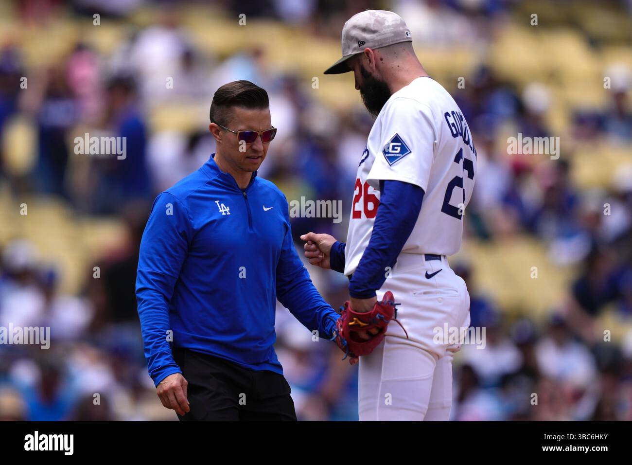 Los Angeles Dodgers starting pitcher Tony Gonsolin right, talks to a ...