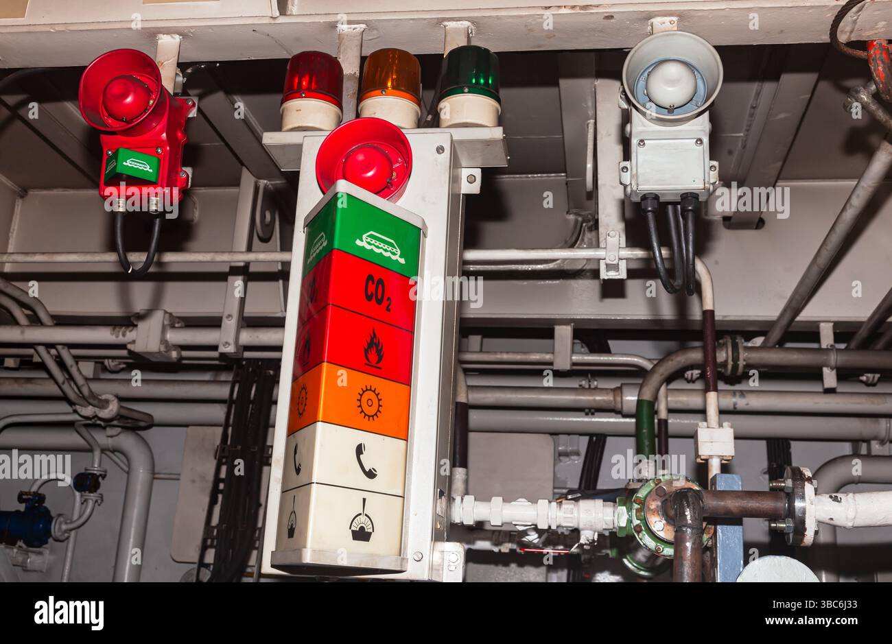 Ship's engine room alarm stand with various alarm options Stock Photo ...