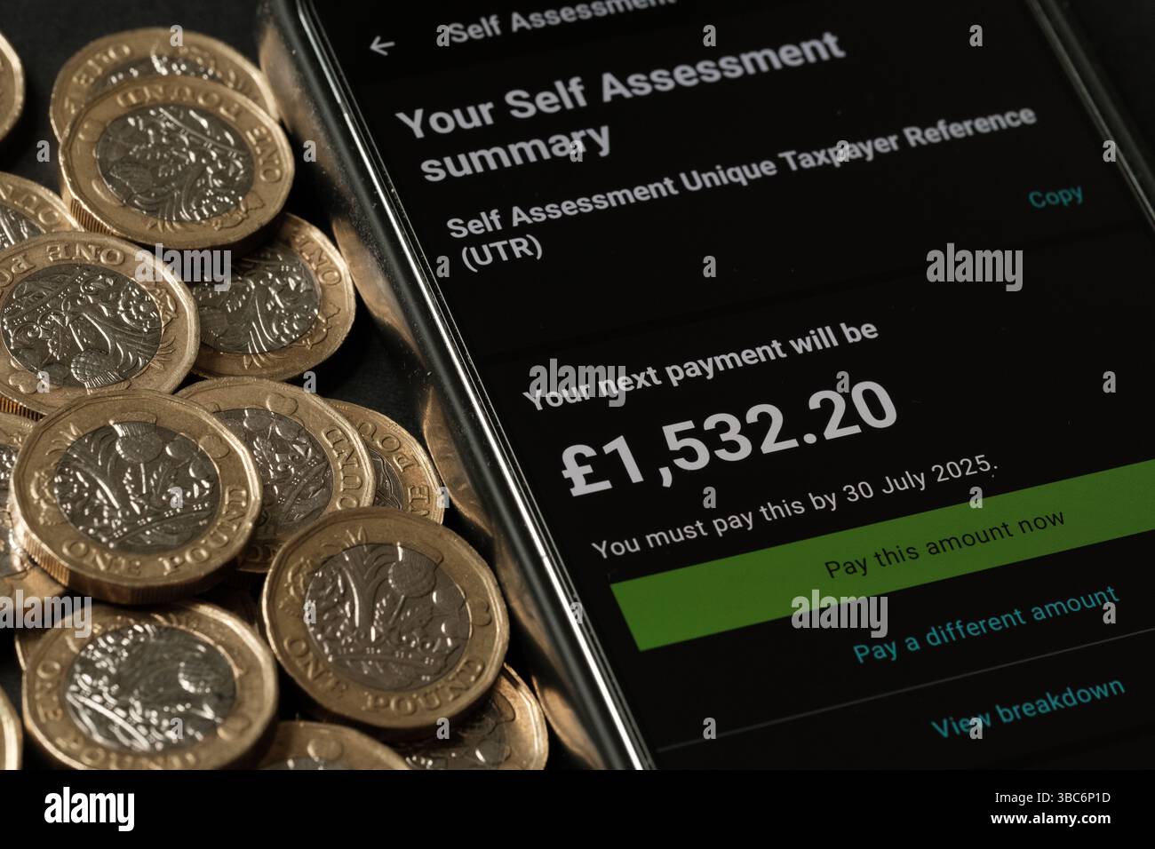Self-assessment tax summary displayed on HMRC mobile app with payment ...