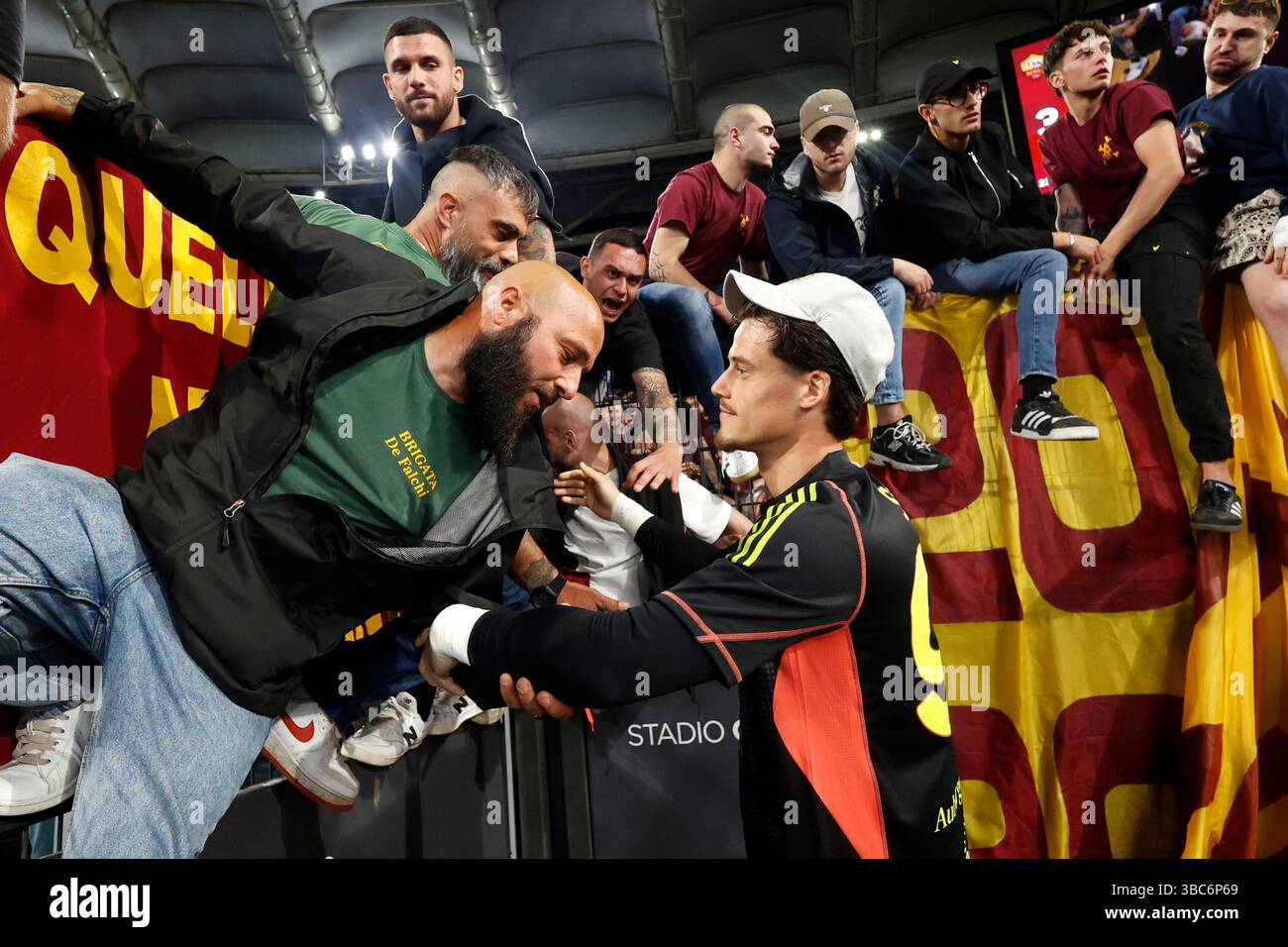Rome, Italy. 18th May, 2025. Mile Svilar, goalkeeper of Roma, greets ...