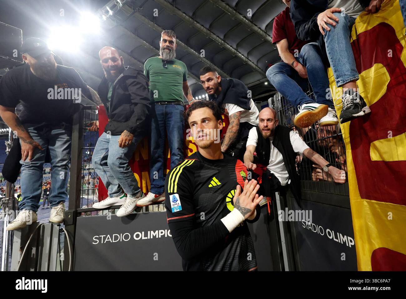 Rome, Italy. 18th May, 2025. Mile Svilar, goalkeeper of Roma, greets ...