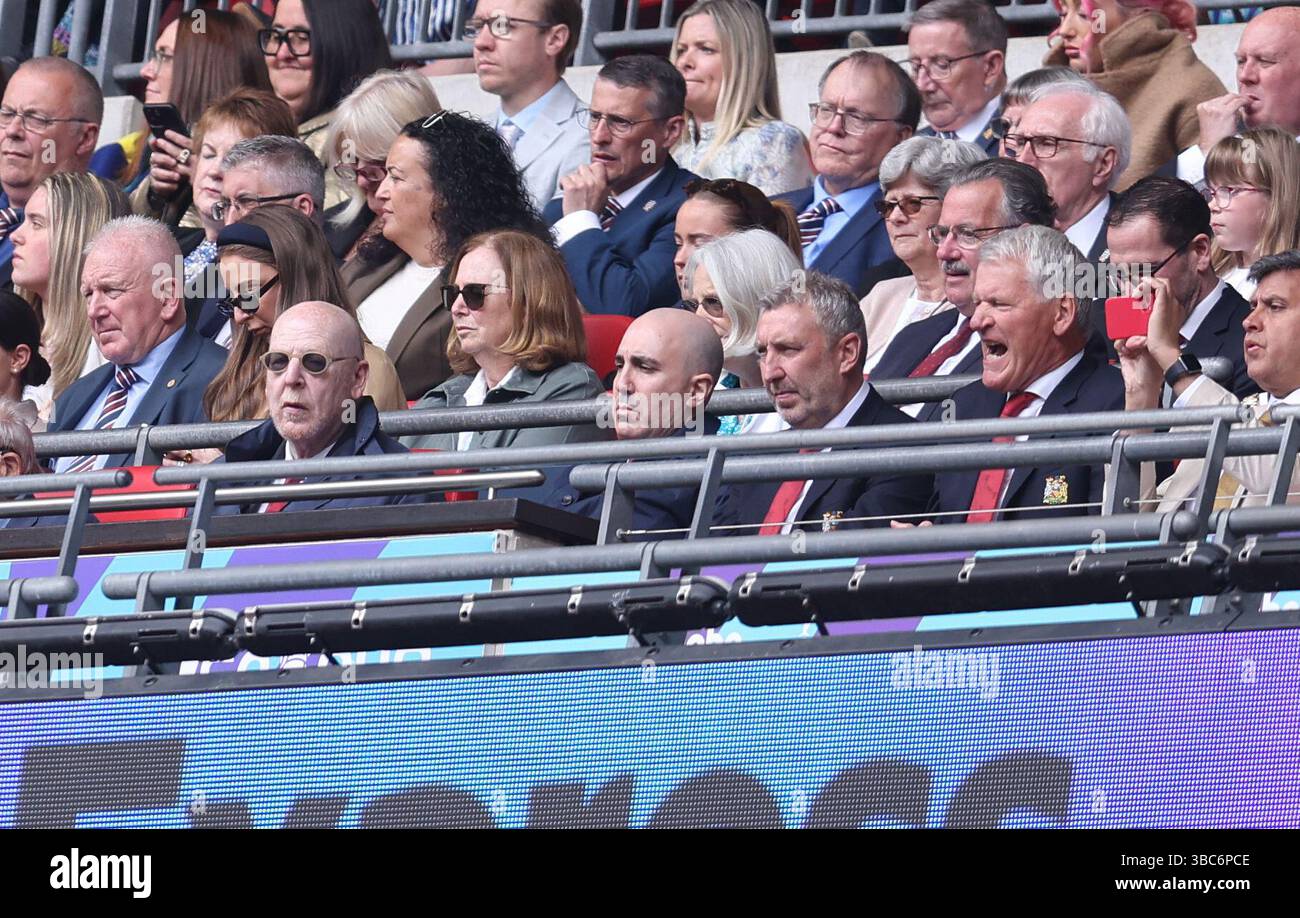 London, UK. 18th May, 2025. David Gill (R) appears to yawn during the ...