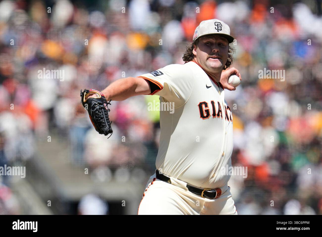 San Francisco Giants pitcher Erik Miller throws to an Athletics batter ...