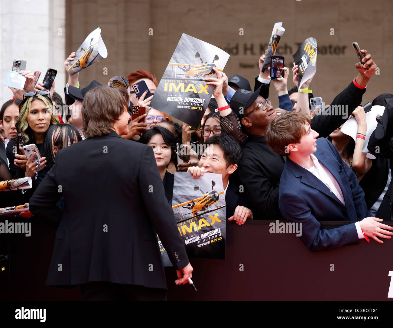 New York, United States. 18th May, 2025. Tom Cruise greets fans when he ...