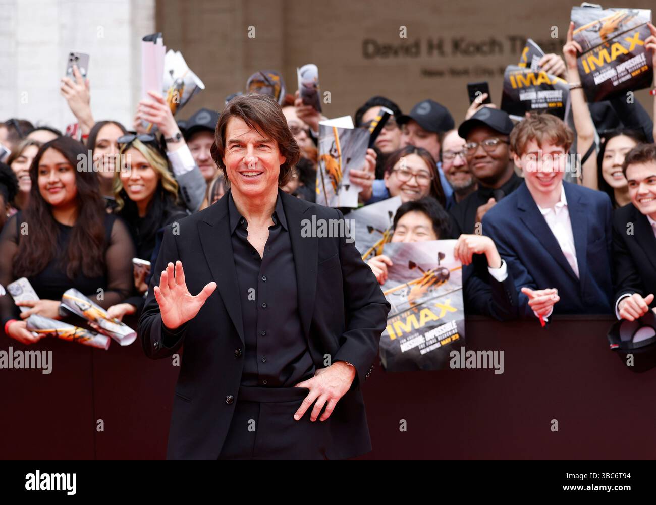 New York, United States. 18th May, 2025. Tom Cruise greets fans when he ...