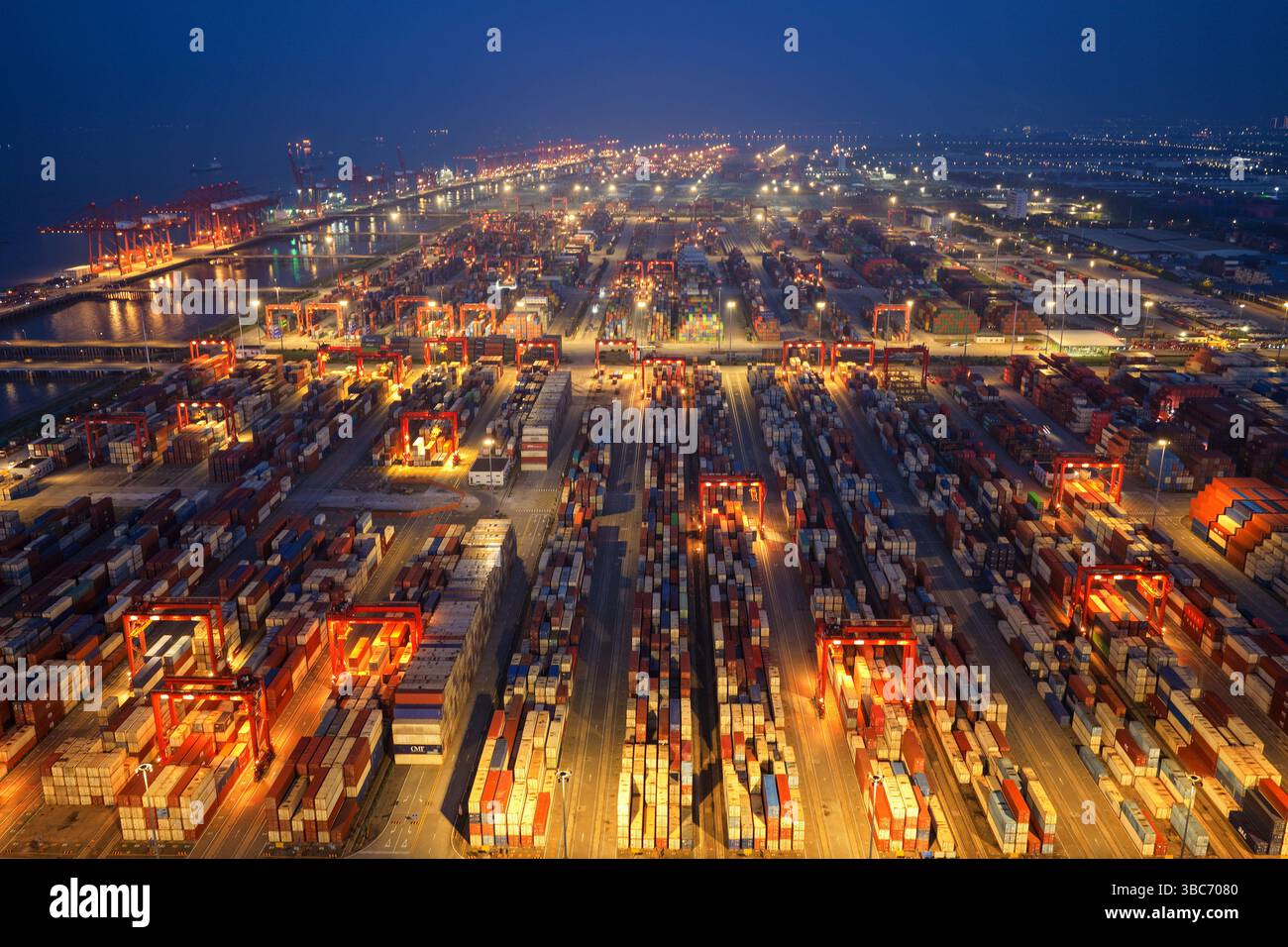 Suzhou, China. 18th May, 2025. Containers piled up at Taicang Port ...