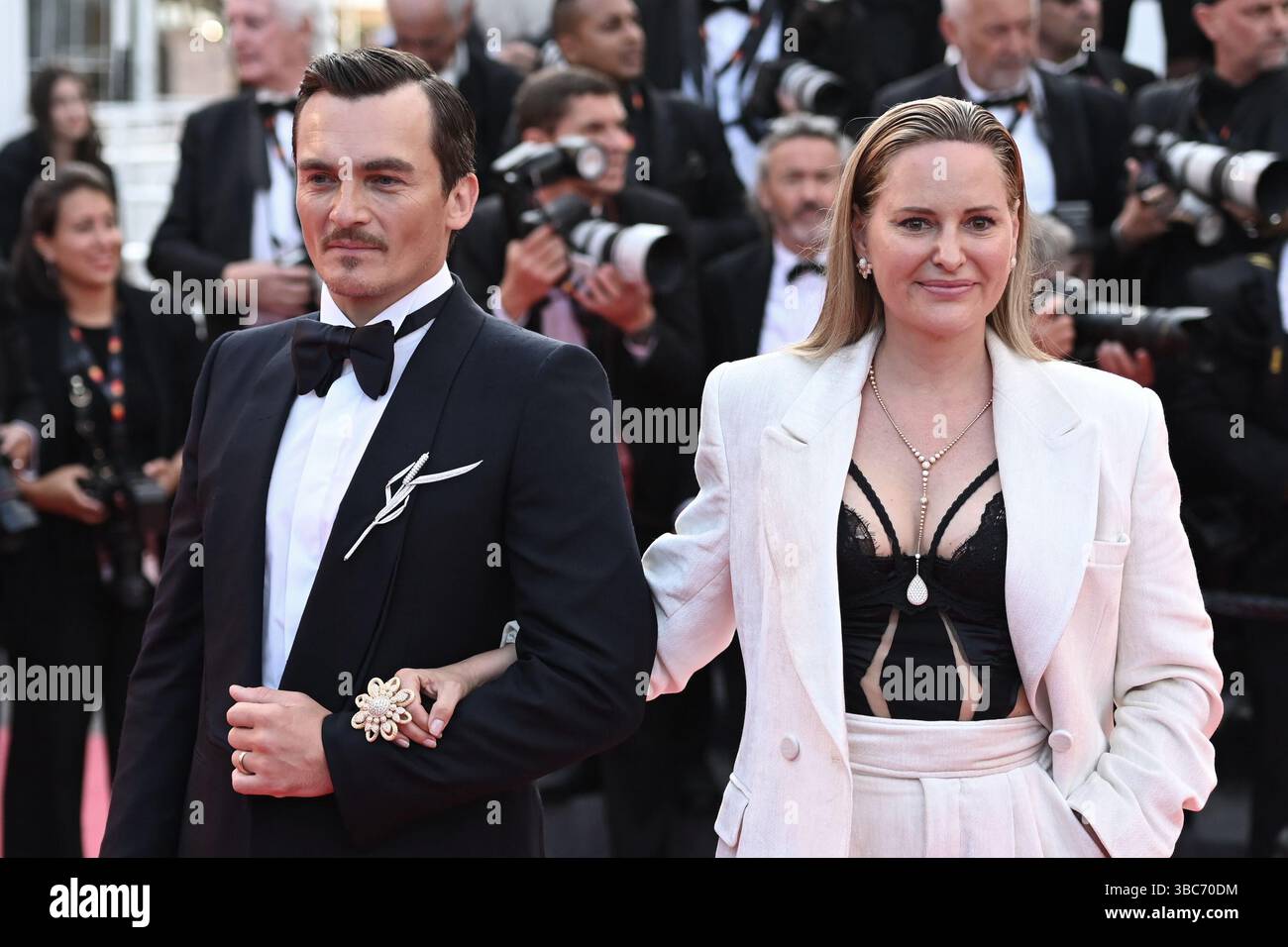 Cannes, France. 18th May, 2025. Rupert Friend and his wife Aimee ...