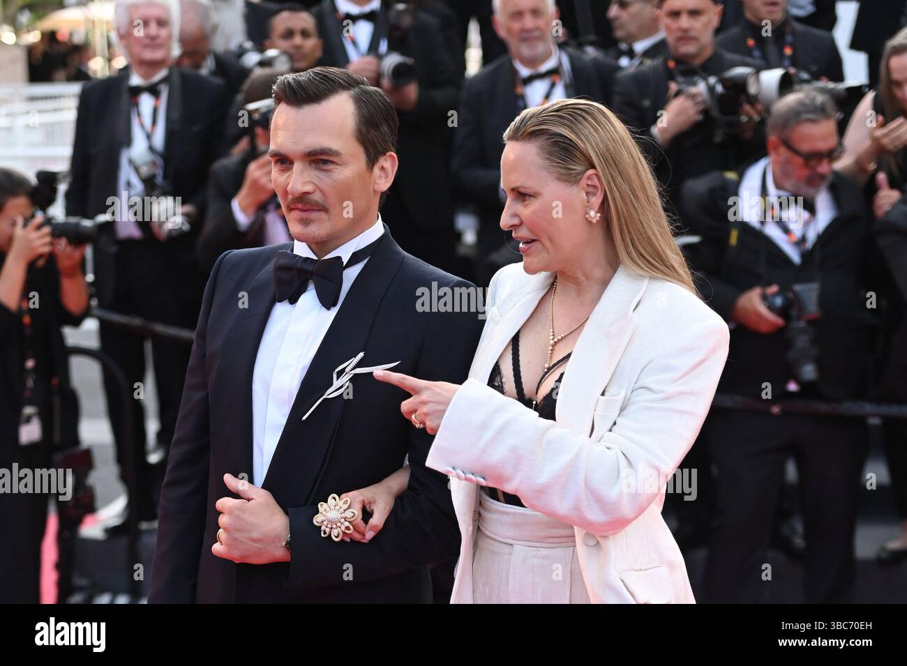 Cannes, France. 18th May, 2025. Rupert Friend and his wife Aimee ...