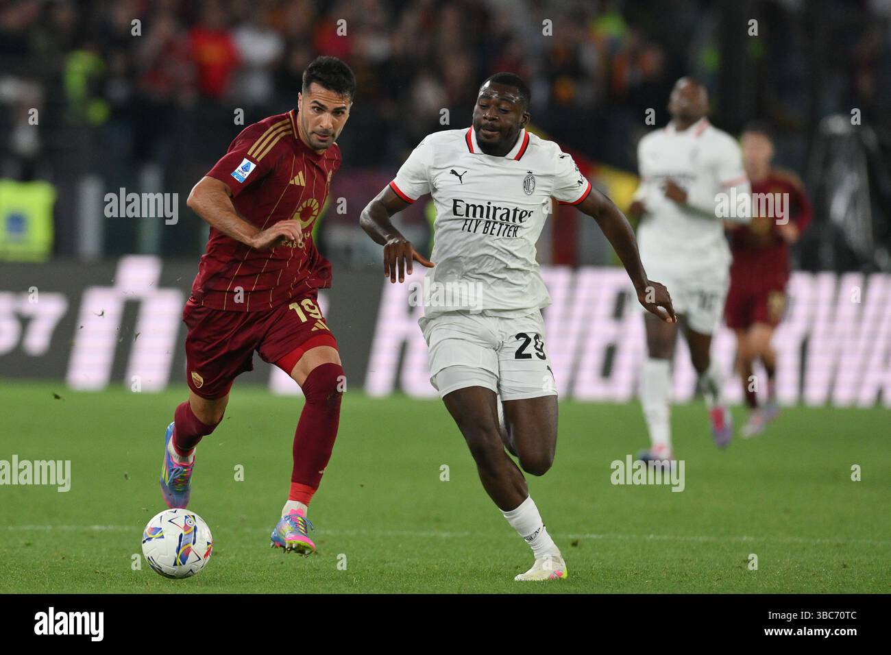 Olimpico Stadium, Rome, Italy - Zeki Celik of AS Roma under pressure from Youssouf Fofana of AC ...