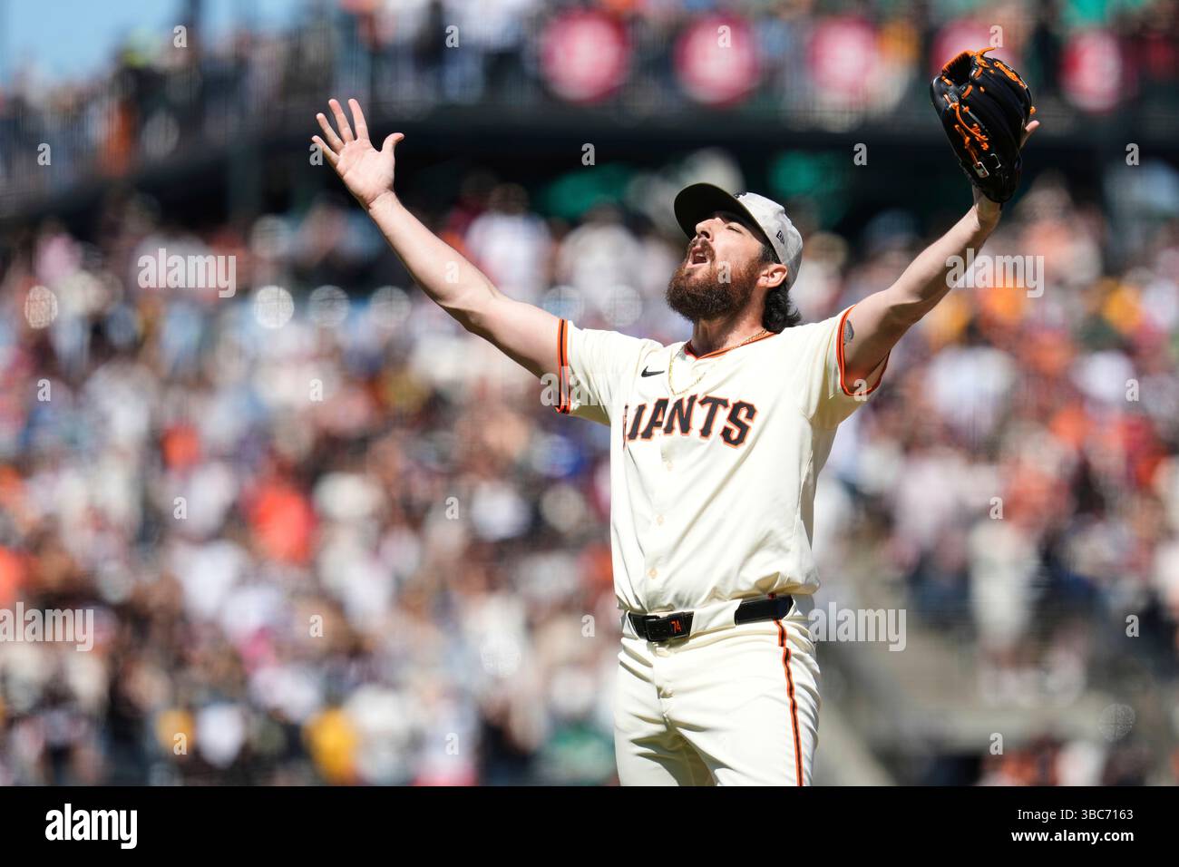 San Francisco Giants pitcher Ryan Walker reacts after striking out ...