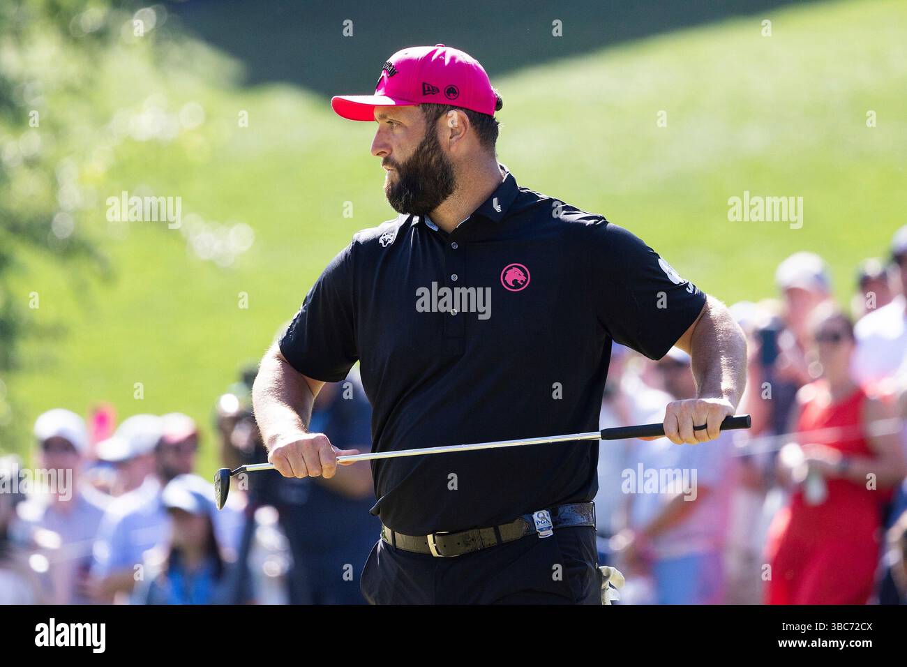 Captain Jon Rahm of Legion XIII reacts after his putt on the 13th green ...