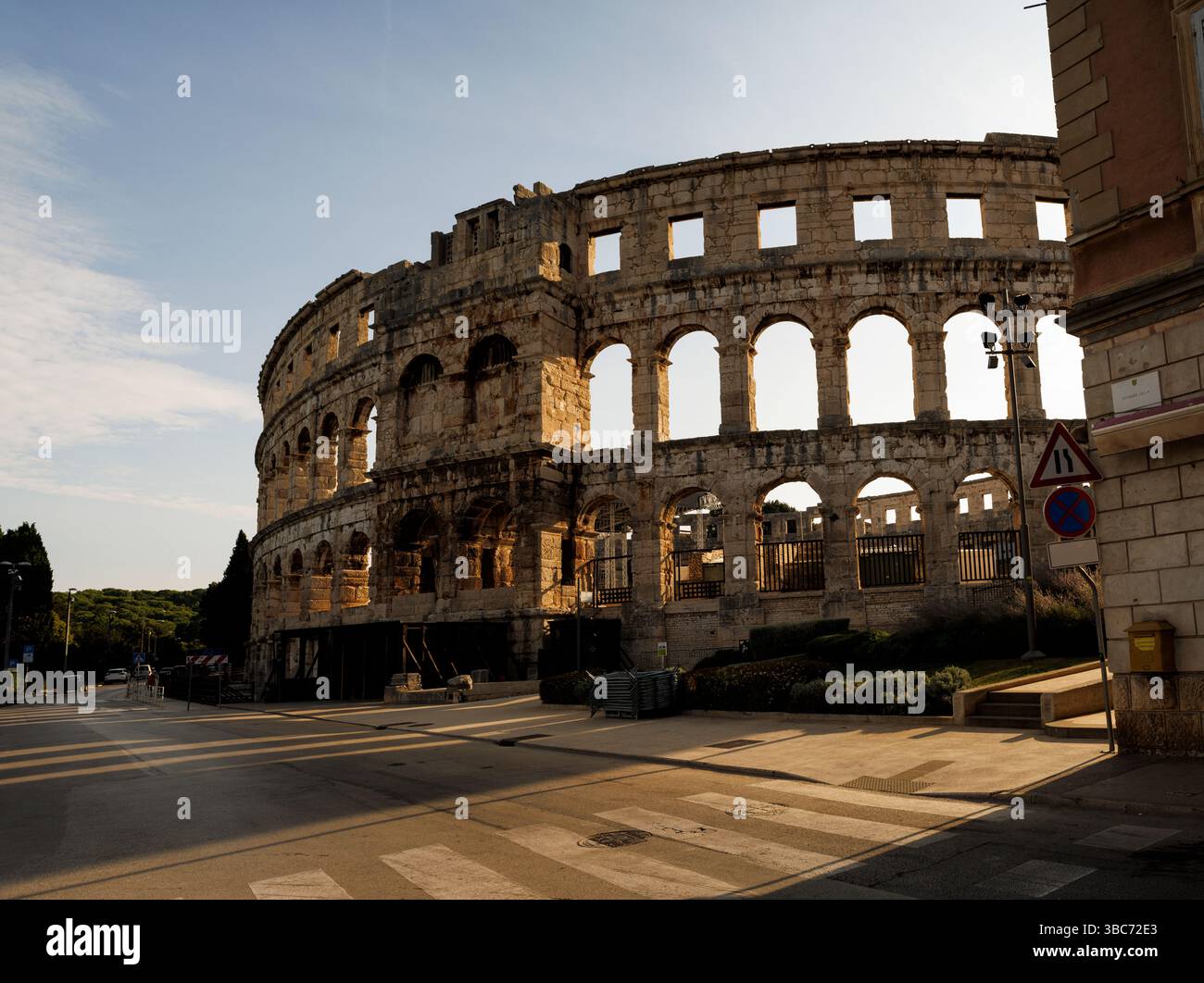 Ancient heritage in Pula, Istria, Croatia. Arches of monumental ancient ...