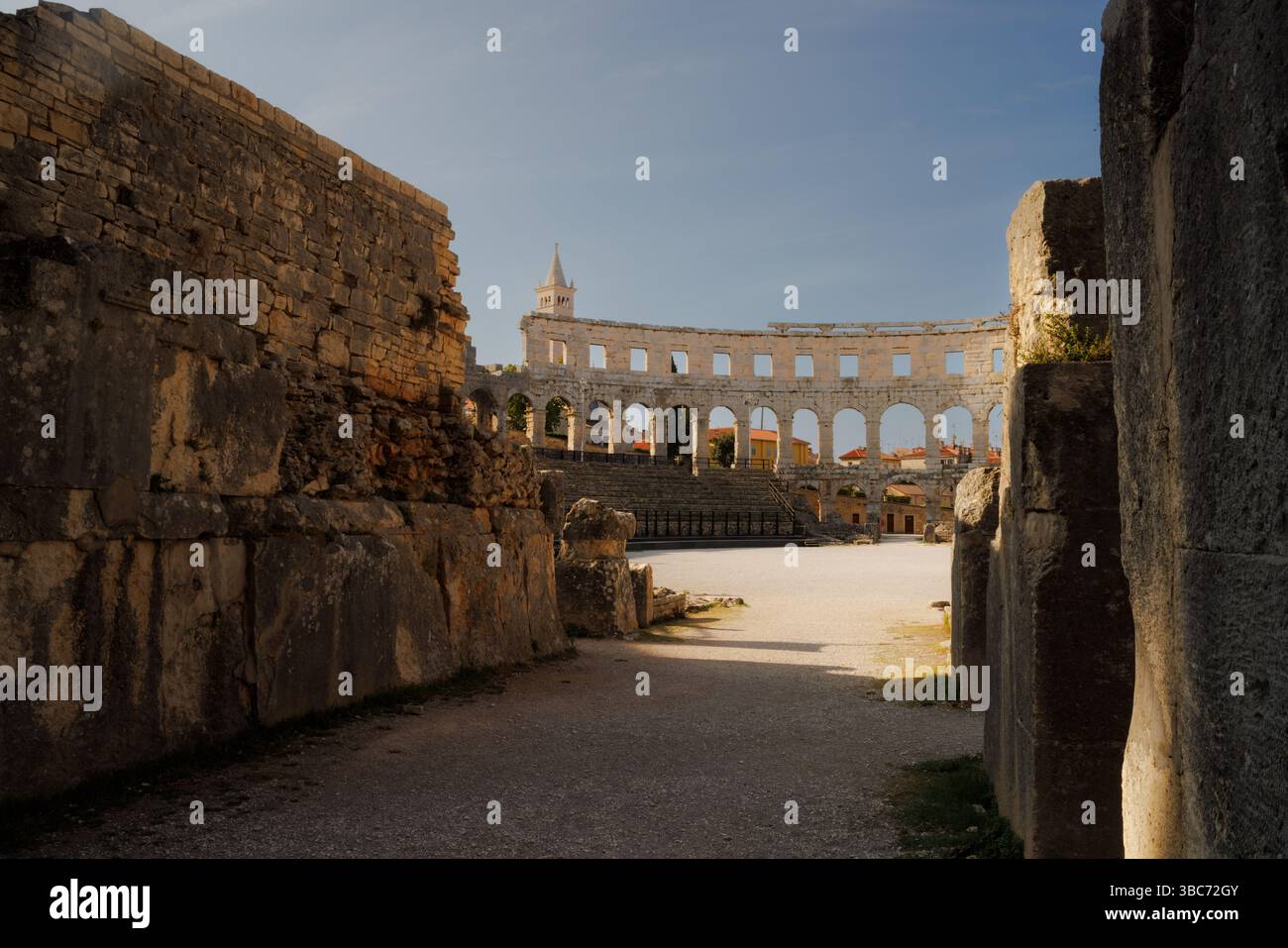 Ancient heritage in Pula, Istria, Croatia. Arches of monumental ancient ...