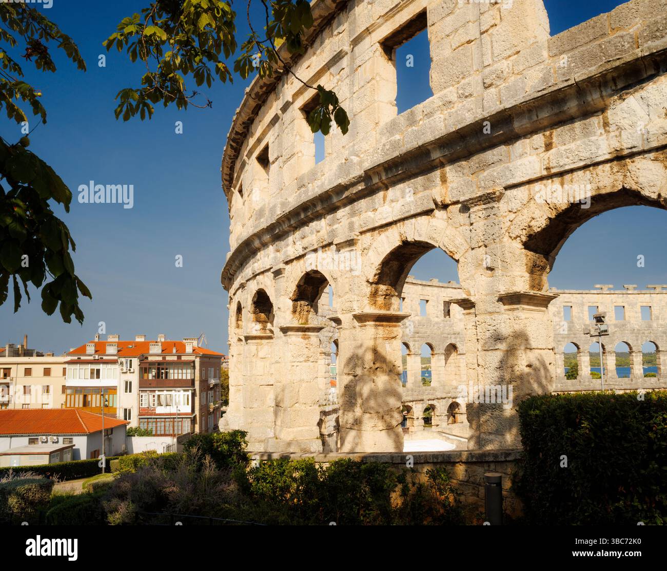 Ancient heritage in Pula, Istria, Croatia. Arches of monumental ancient ...