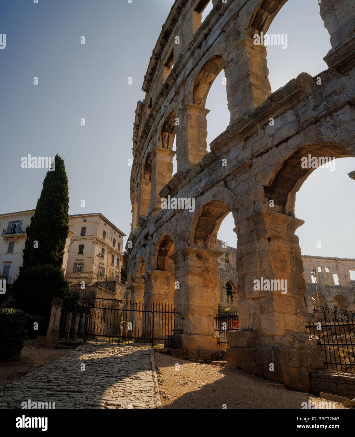 Ancient heritage in Pula, Istria, Croatia. Arches of monumental ancient ...