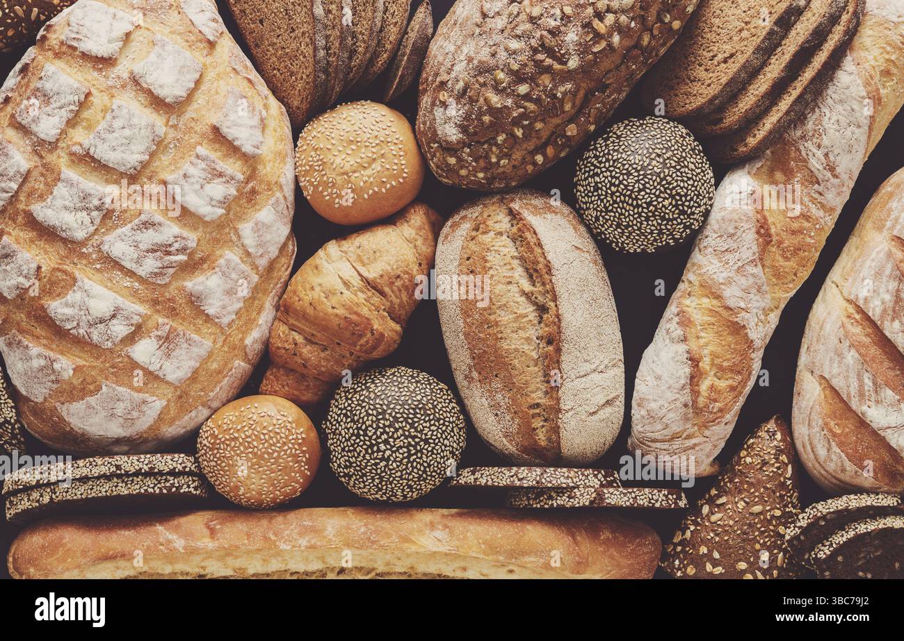 Bread background, top view of white, black and rye loaves Stock Photo ...