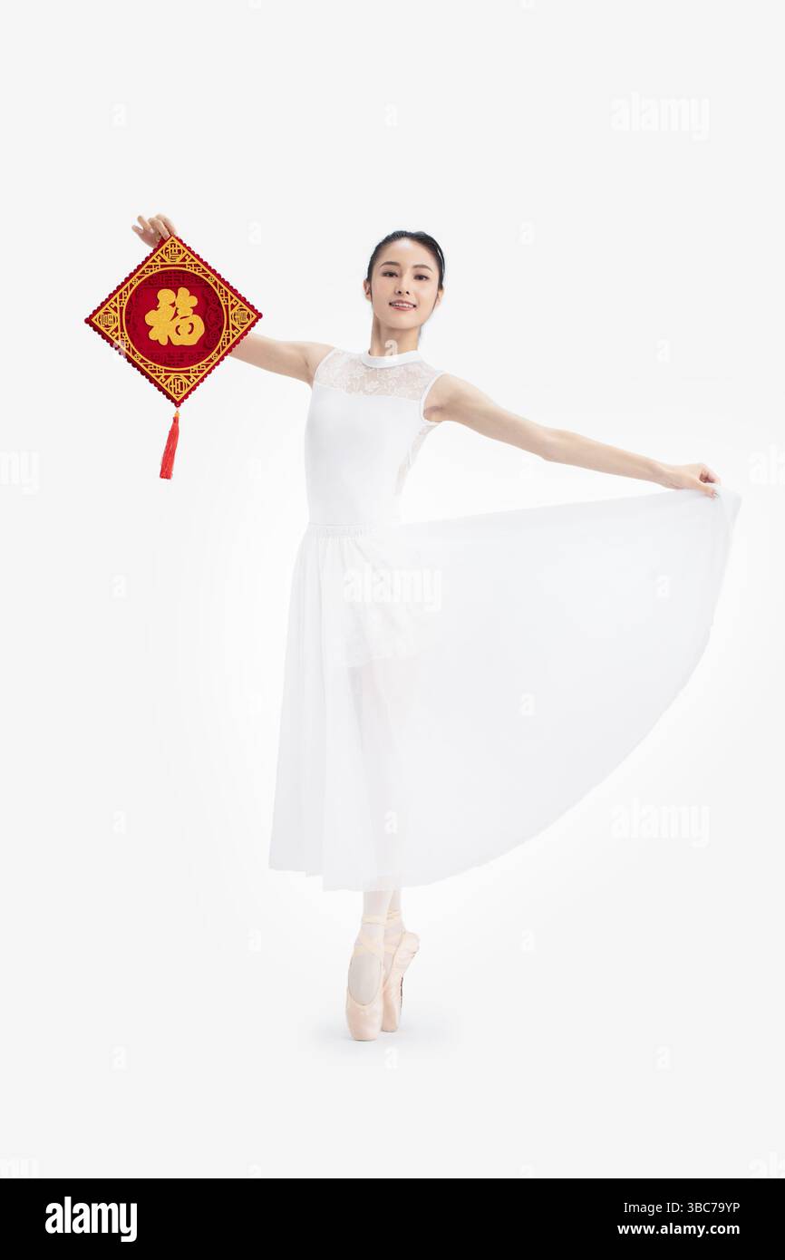a ballet dancer holding Spring Festival decorations Stock Photo - Alamy