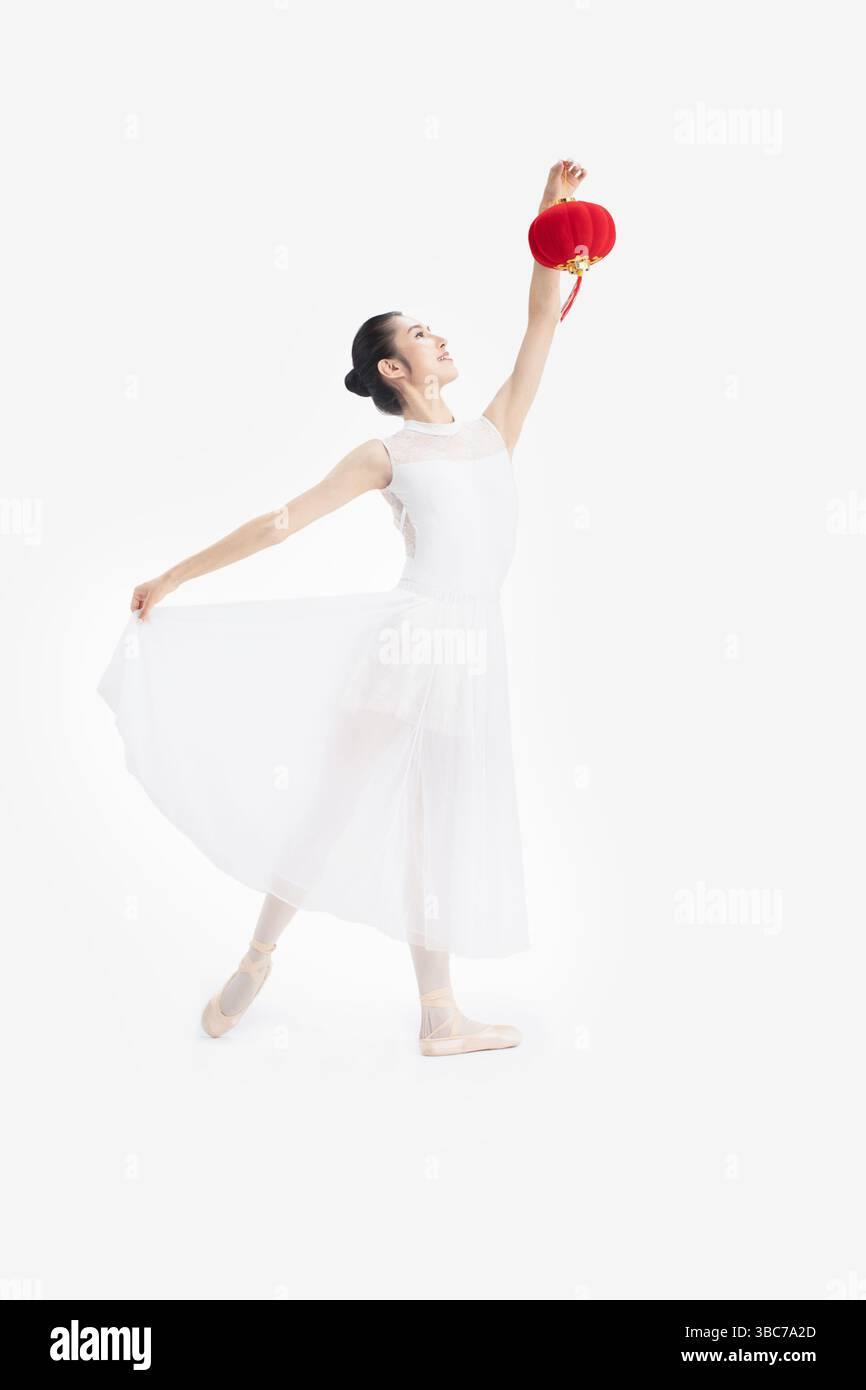 a ballet dancer holding Spring Festival decorations Stock Photo - Alamy