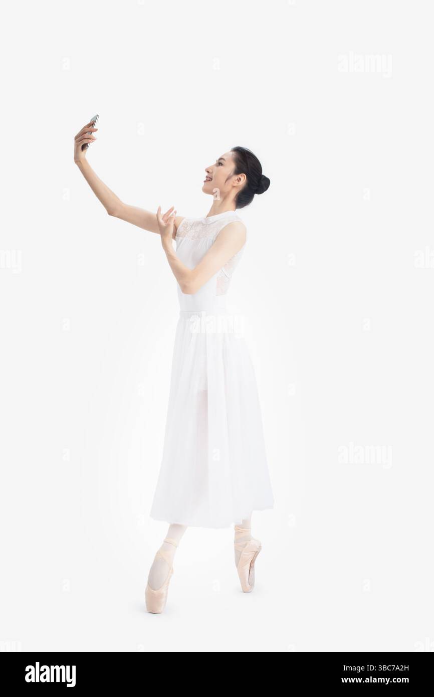 One asian woman smartphone Cut Out Stock Images & Pictures - Alamy