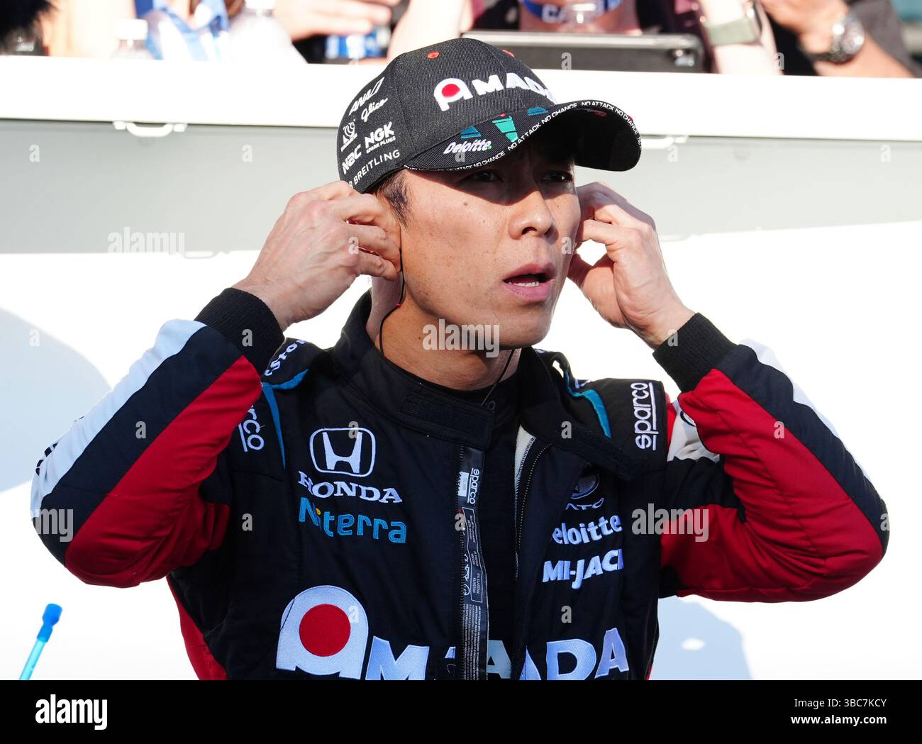 INDIANAPOLIS, IN - MAY 18: IndyCar driver Takuma Sato watches ...