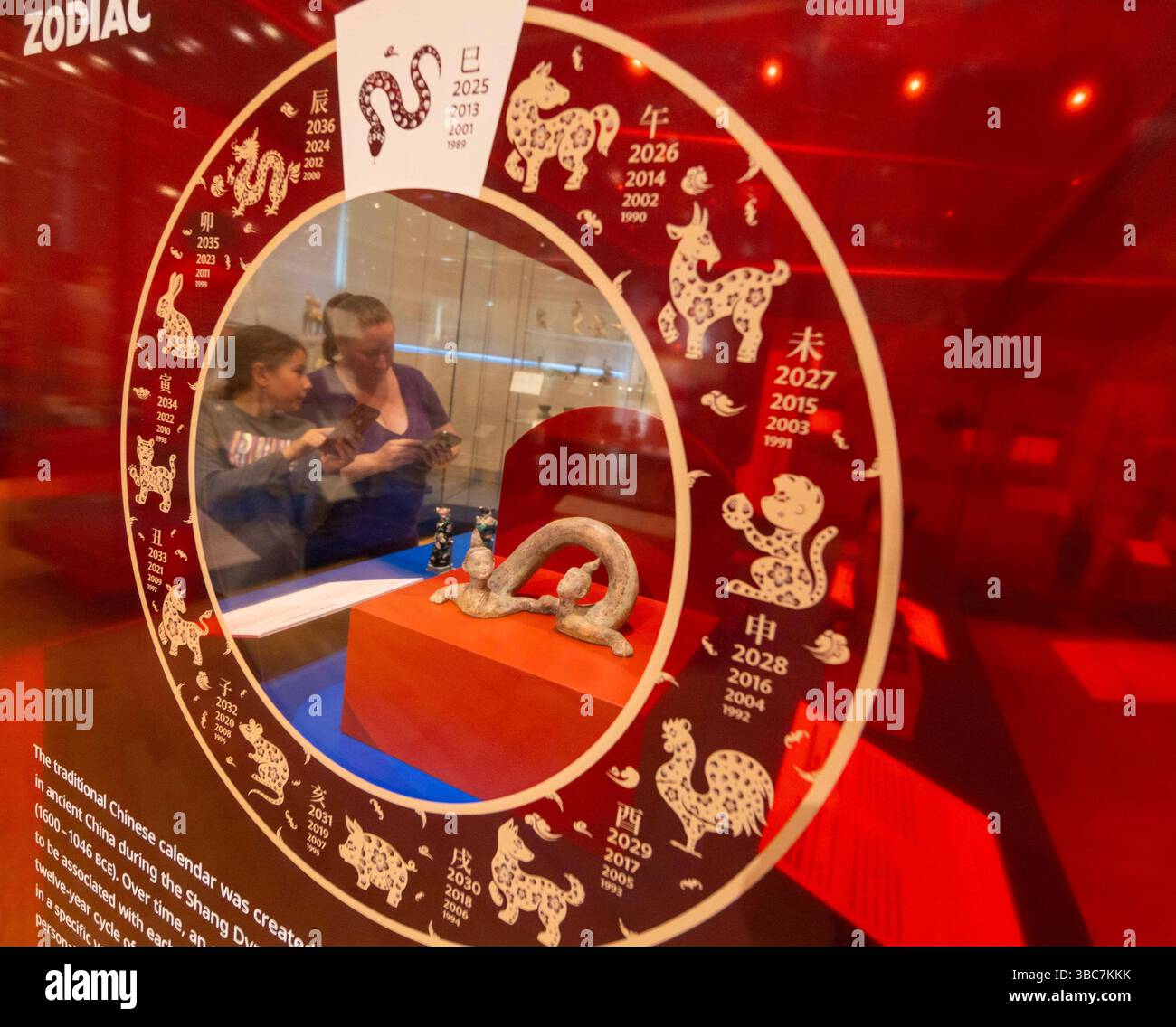 Toronto, Canada. 18th May, 2025. Visitors capture images of Chinese zodiac cases at the Royal ...