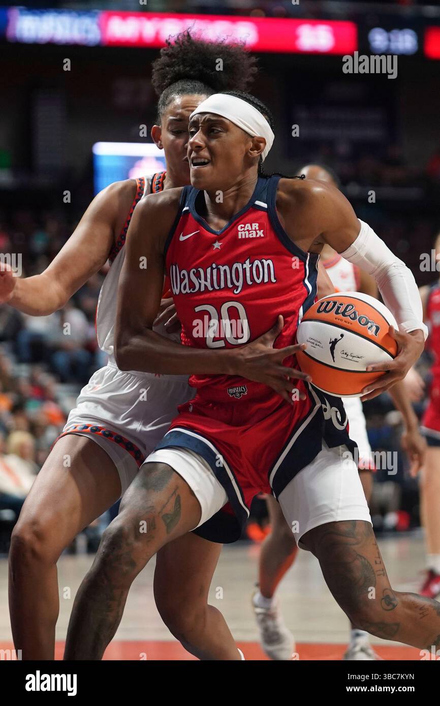 Washington Mystics guard Brittney Sykes (20) looks to pass around ...