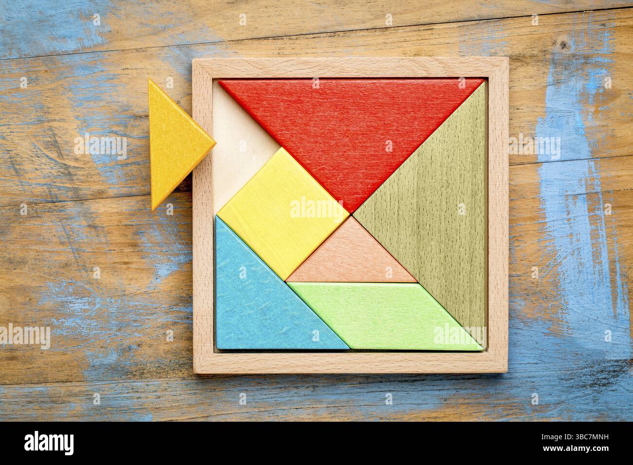 Tangram, a traditional Chinese Puzzle Game made of different wood parts ...