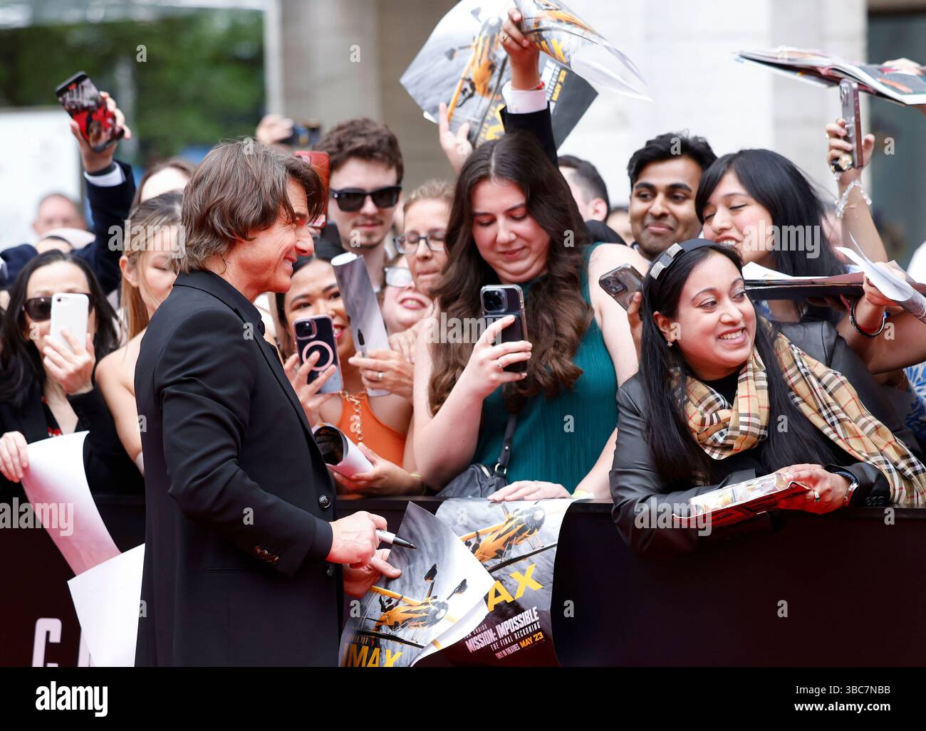 New York, United States. 18th May, 2025. Fans react when Tom Cruise ...