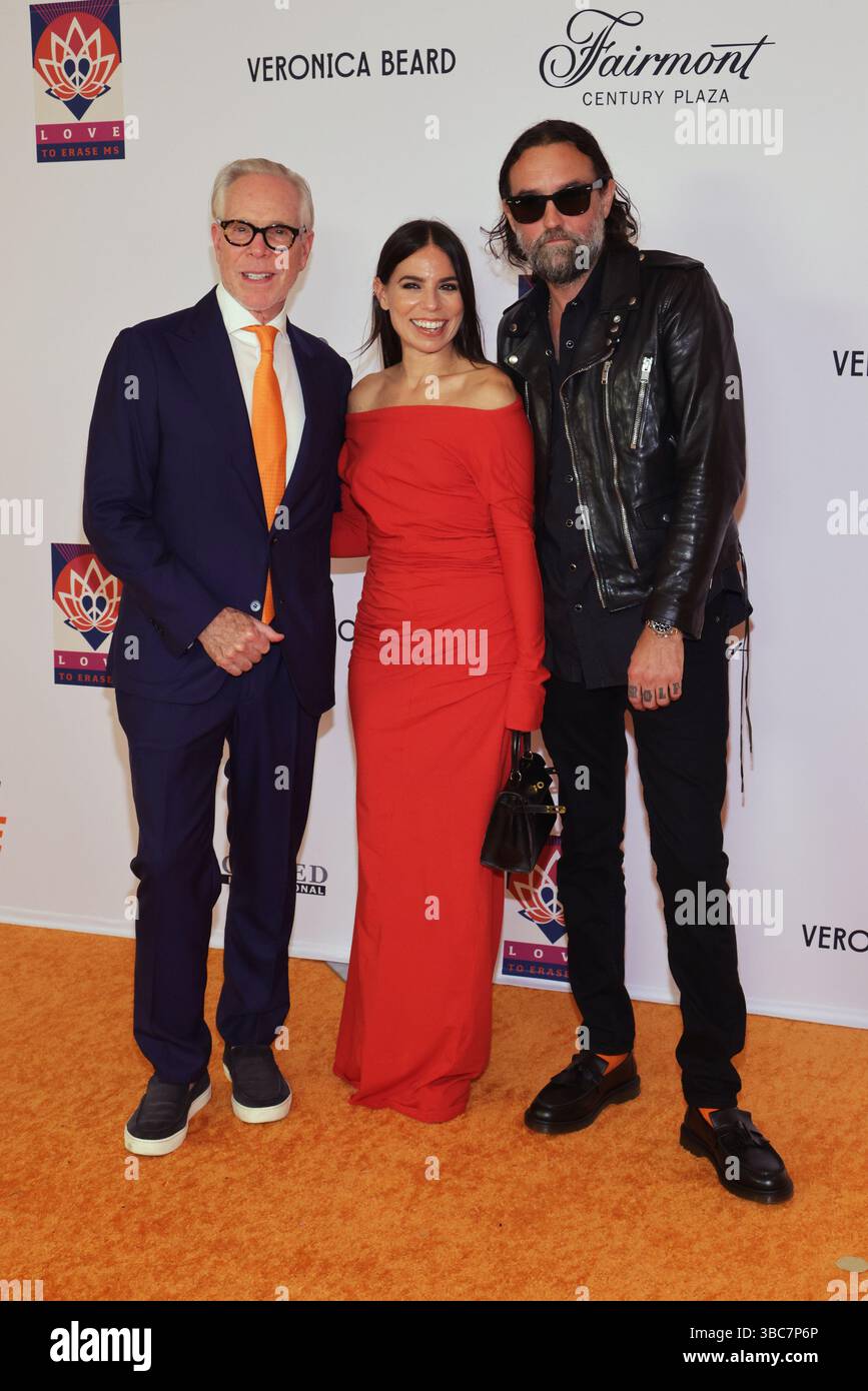 Tommy Hilfiger, Ally Hilfiger and Steve Hash attends the 32nd Annual Race To Erase MS Gala at ...