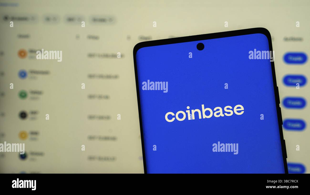 Dhaka, Bangladesh 16 May 2025: Coinbase app running at smartphone screen with Coinbase logo at ...