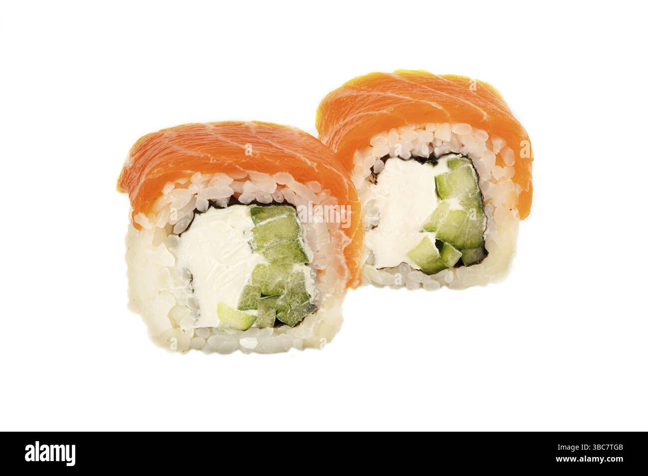 Sushi close-up in front of a white background. Sushi roll with red fish ...