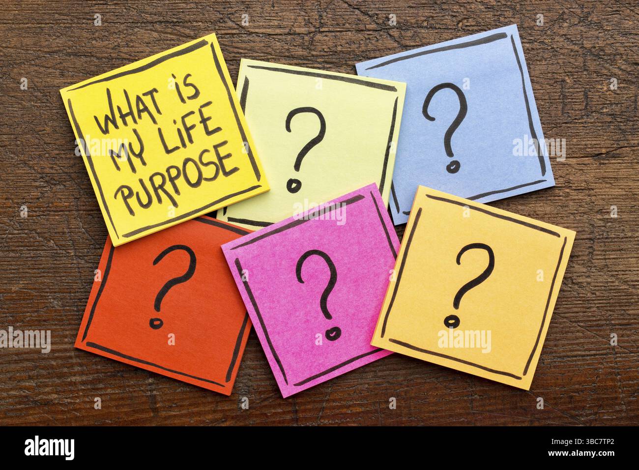 What is my life purpose? Handwriting on sticky notes with multiple ...