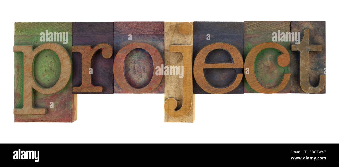The word project in vintage letterpress type blocks, stained by color ...