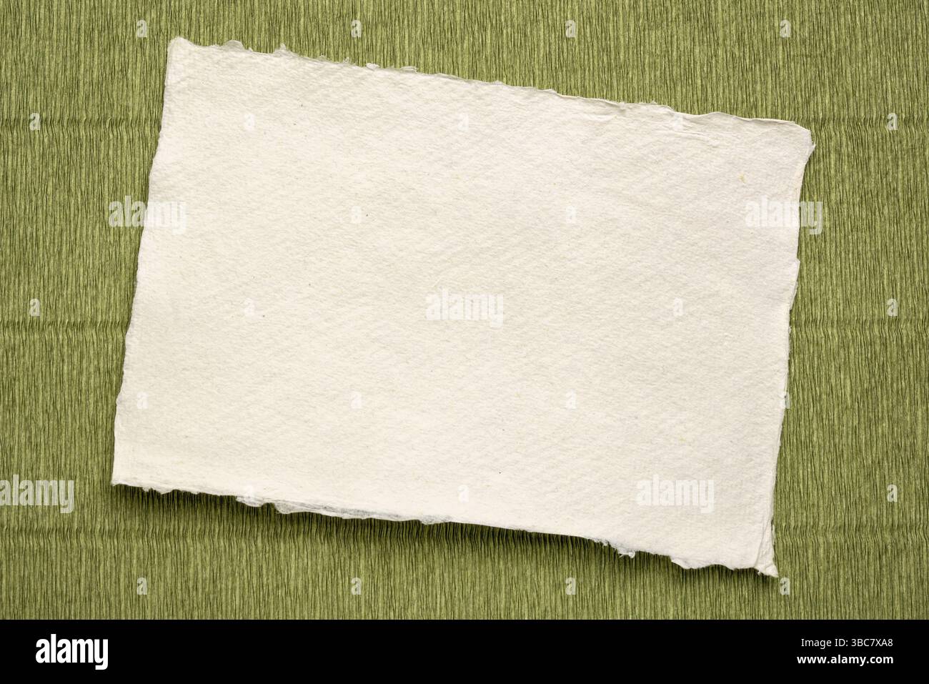Small sheet of blank white Khadi rag paper from South India against ...