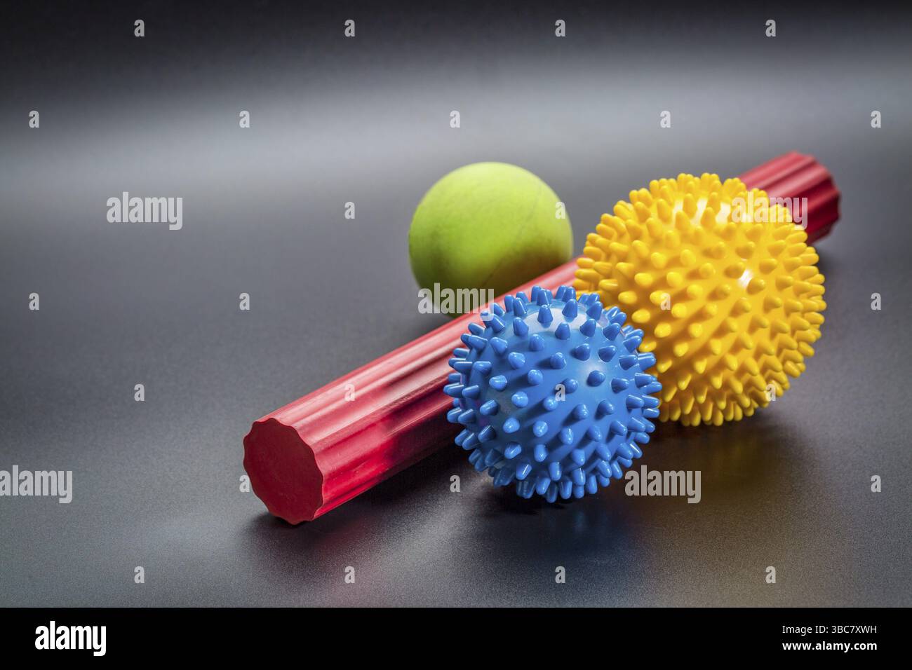 Self massage and reflexology therapy concept - a set of small rubber ...