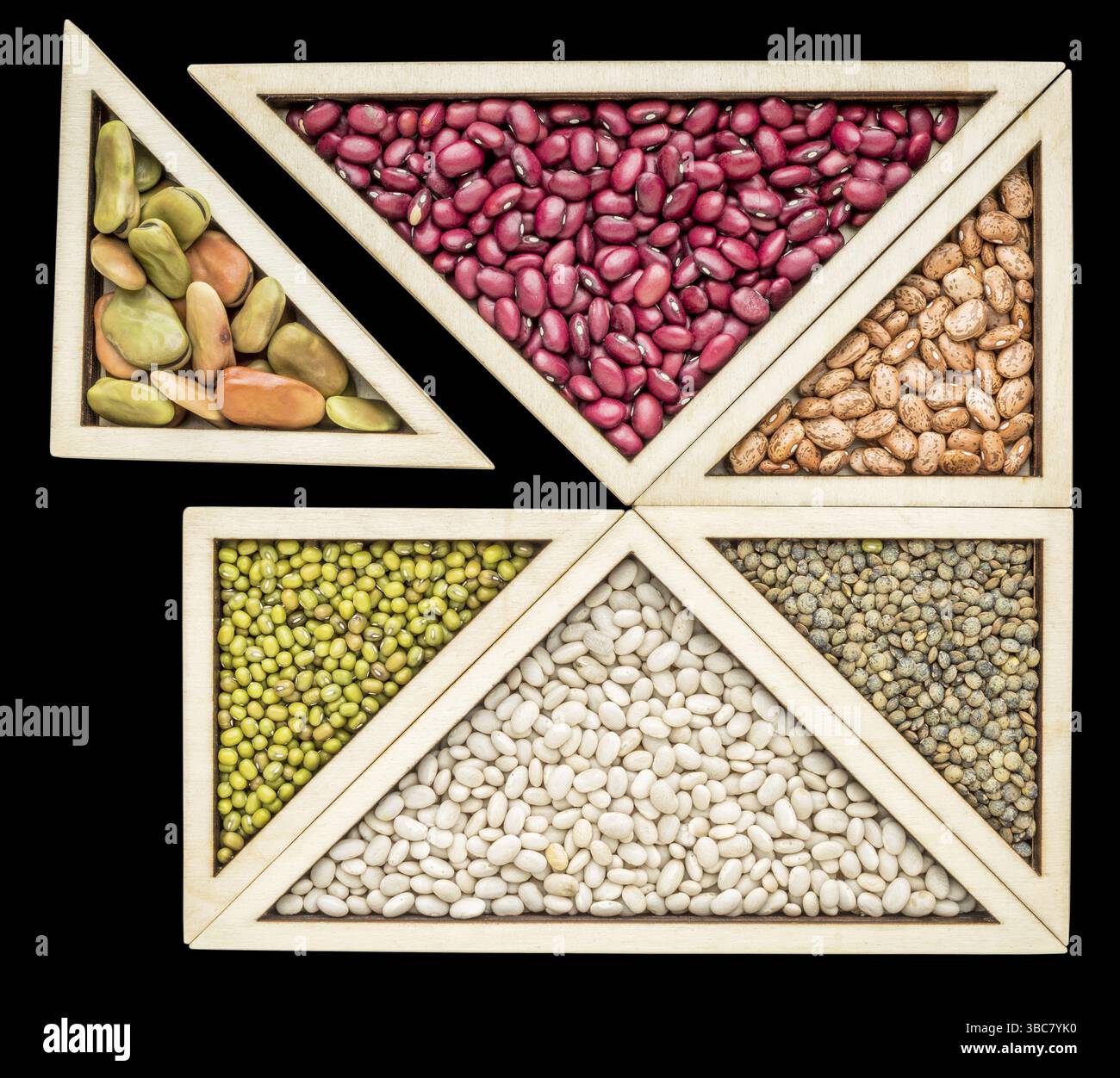 Variety of beans and lentils in a wooden tray inspired by Chinese ...