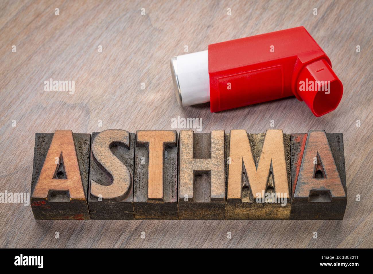 Asthma word abstract in vintage letterpress wood type with an inhaler ...