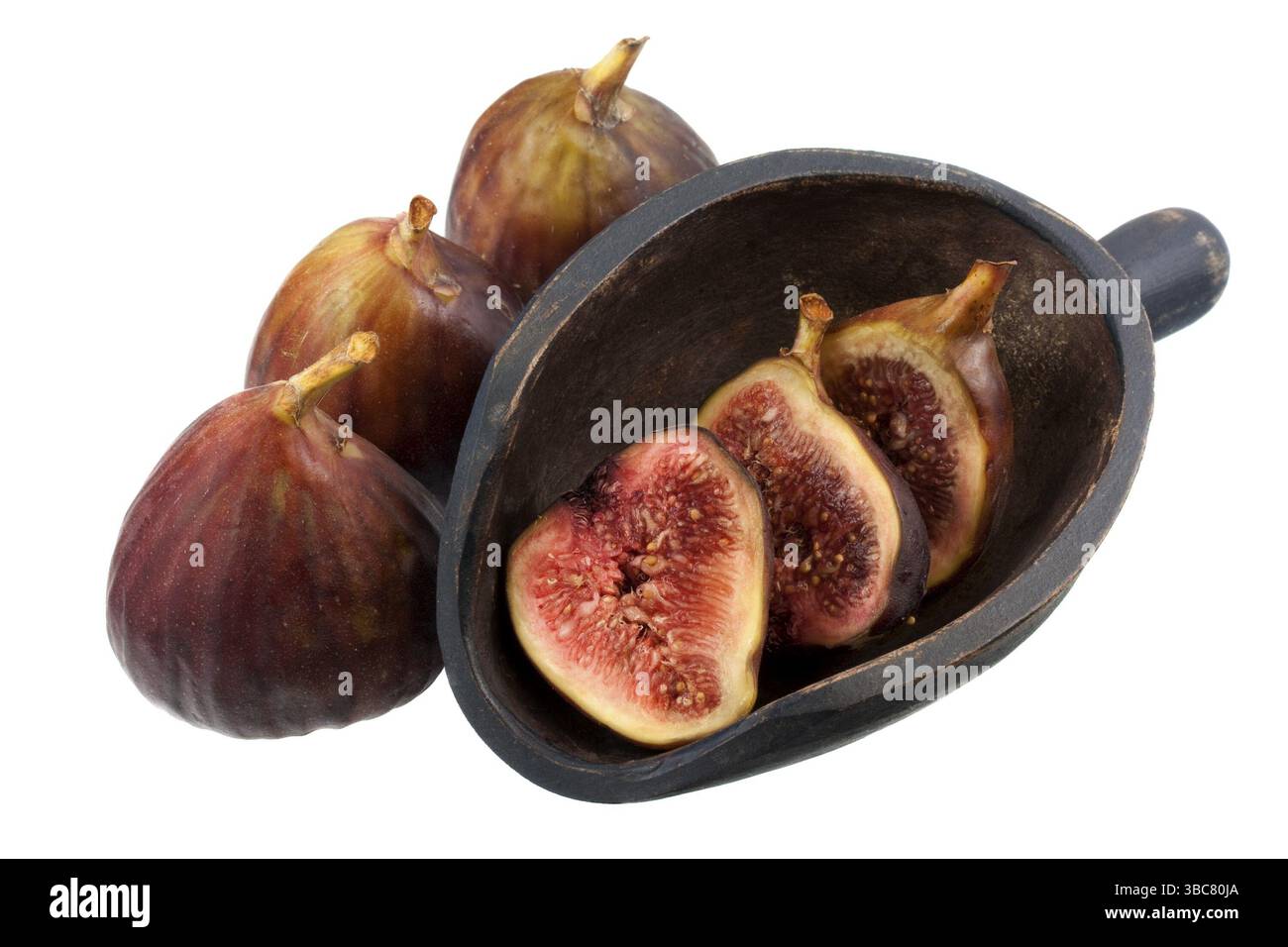 Fresh Turkish figs with a rustic, wooden scoop, isolated on white ...
