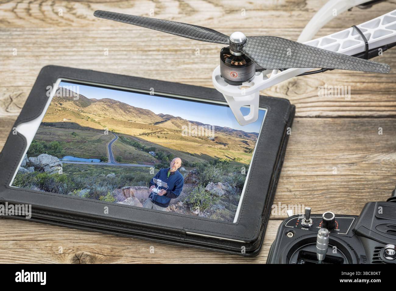 Aerial photography concept - reviewing aerial picture of a drone ...