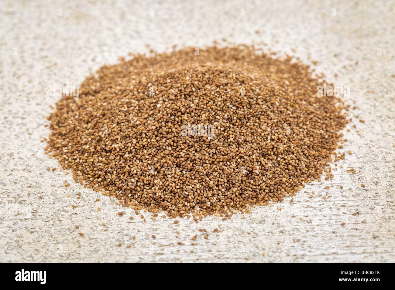 Gluten free teff grain - a small pike against rustic barn wood Stock ...