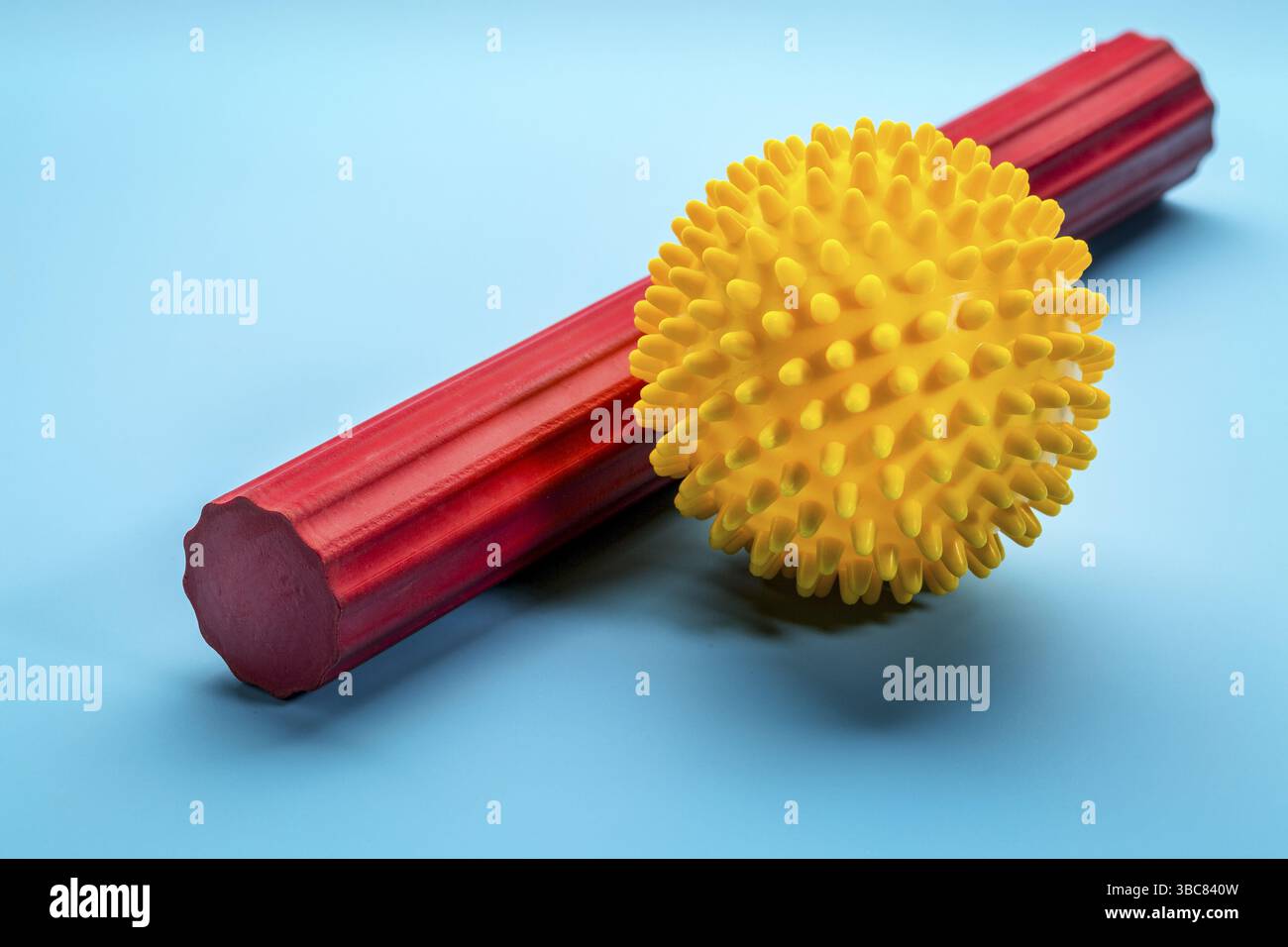 Spiky rubber ball and roller bar for self massage, reflexology and ...