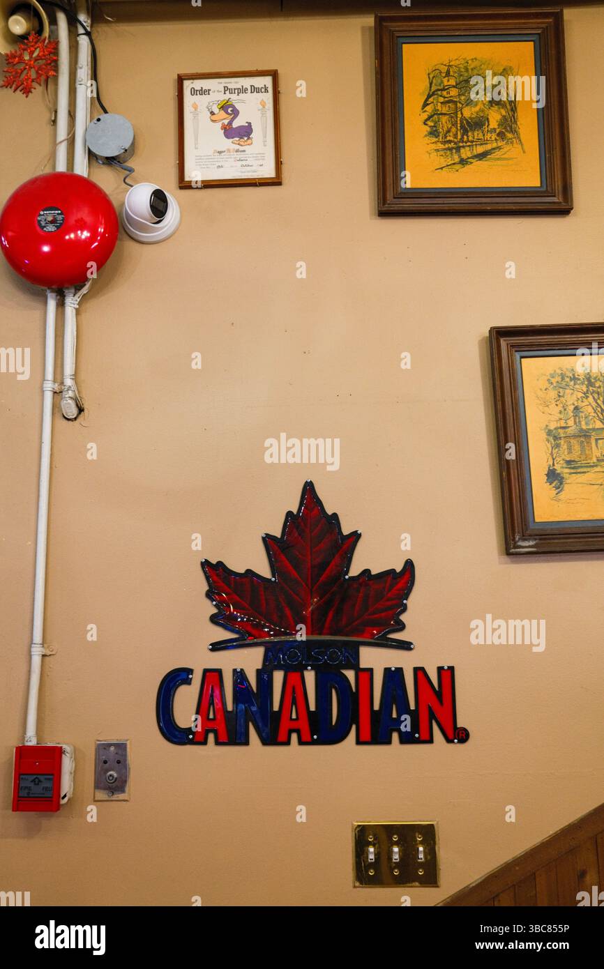 A vintage Molson Canadian sign & fire alarm at Commodore Bowling ...