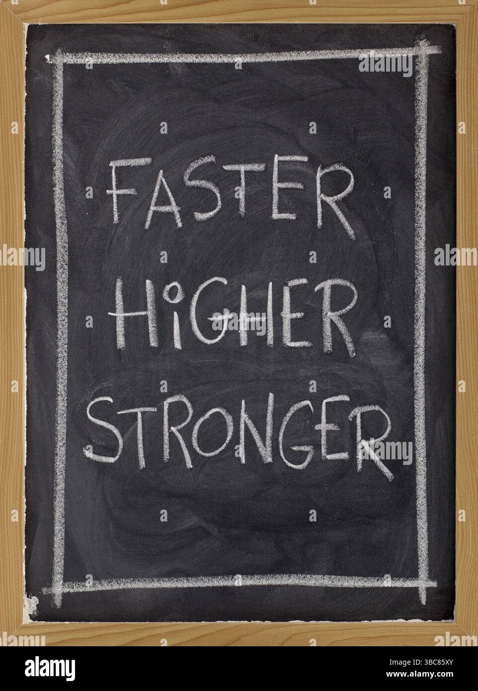 Olympic motto (faster, higher, stronger) handwritten with white chalk ...
