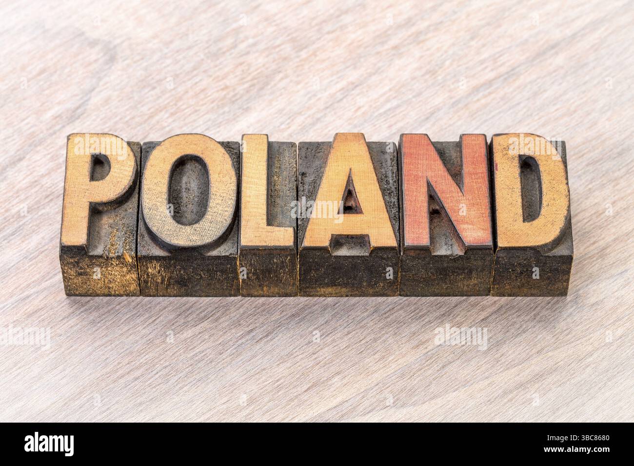 Poland word in vintage letterpress wood type against grained wood Stock ...